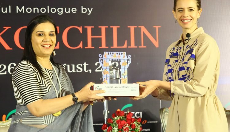 RITU-SHAH-CHAIRPERSON-OF-FLO-SEEN-PRESENTING-A-MOMENTO-TO-ACTRESS-KALKI ...