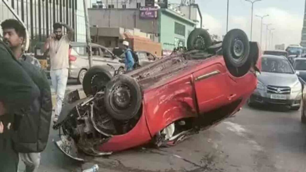 Speeding Car Overturns After Hitting Divider And Two-Wheeler At JNTU Bridge